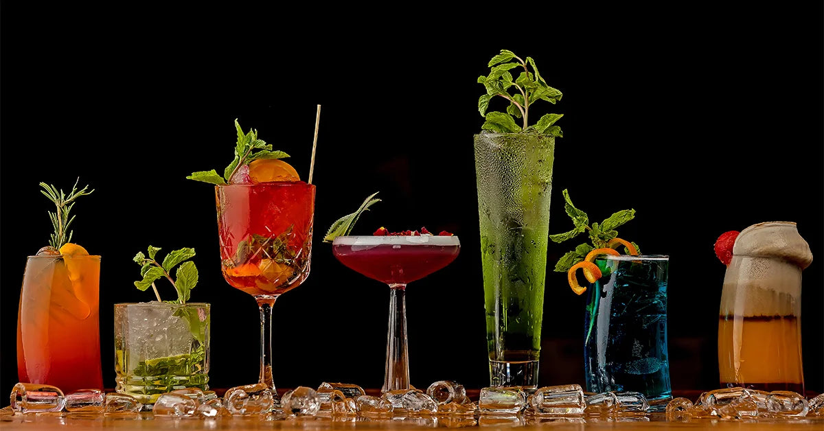 a_table_topped_with_lots_of_different_types_of_drinks.webp?v=1699533205 ...
